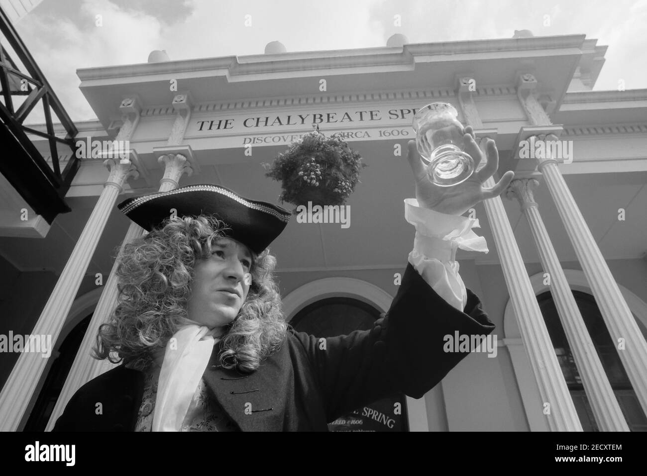 Chalybeate Spring Dipper in period costume holding a glass of spring ...