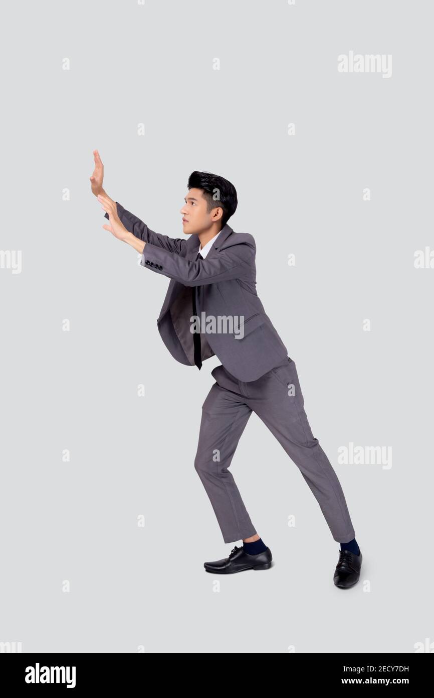 Business man pushing something hi-res stock photography and images - Alamy