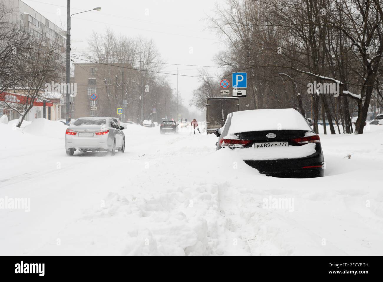 Moscow, Russia. 13th February 2021.A blizzard covered the city. Cars ...