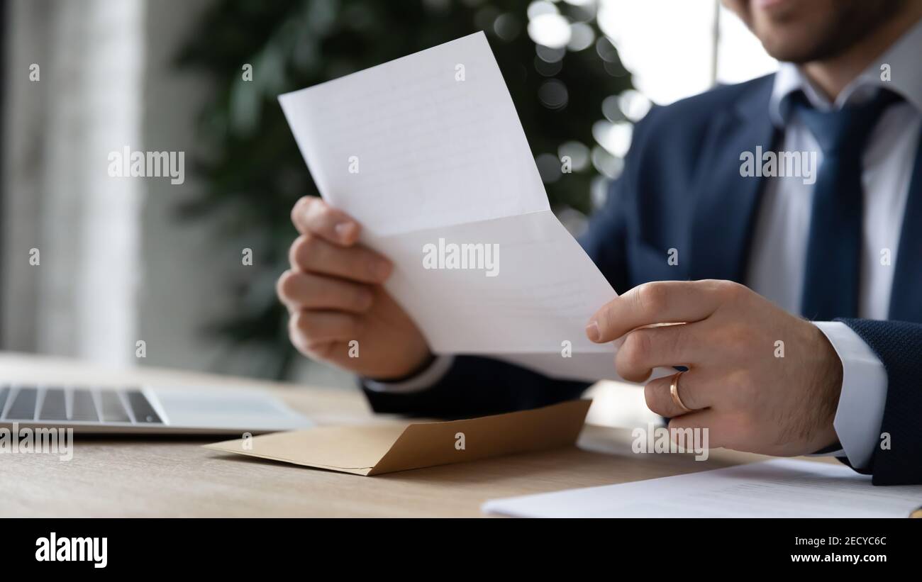 Caucasian businessman consider paperwork hi-res stock photography and ...