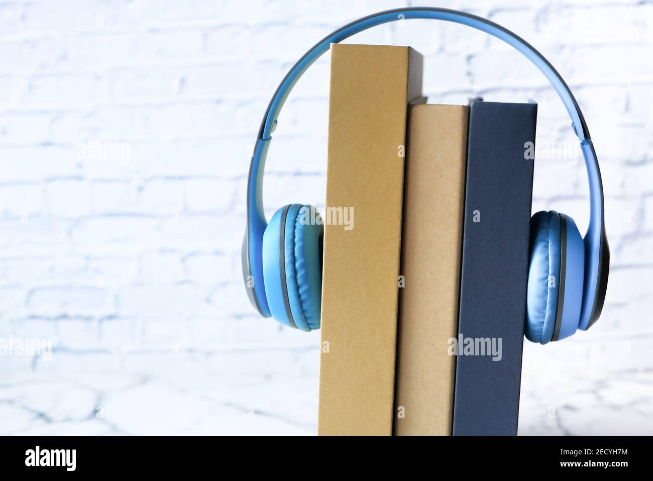 Audio book concept. Headphones and notepad on white background Stock ...