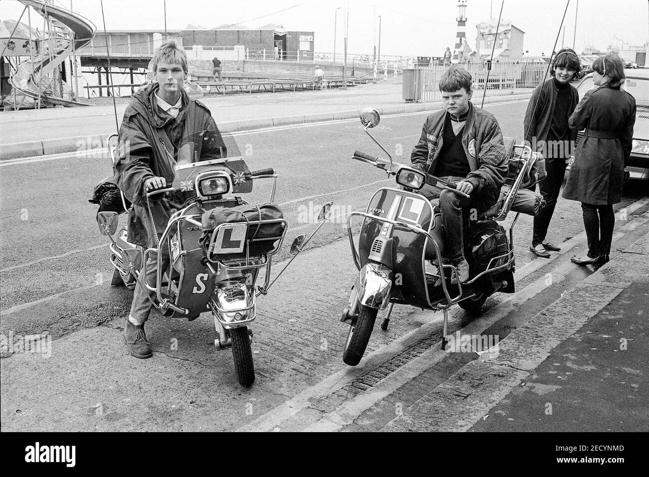 Mods on Scooters Outside Amusement Arcade Stock Photo - Alamy