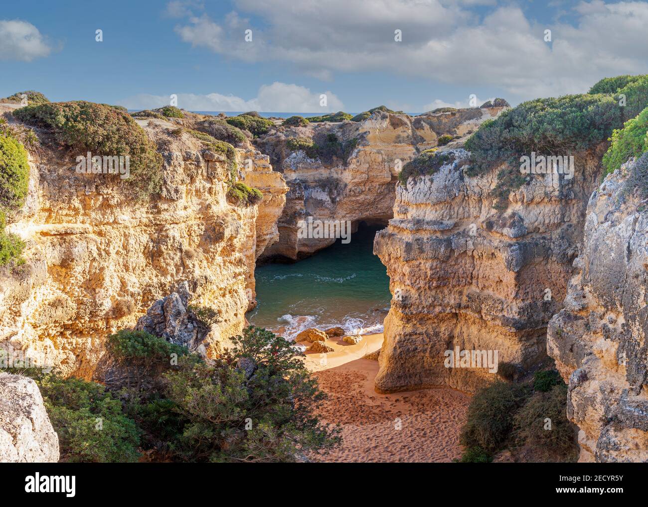 small point beach a hidden beach enclosed by cliffs on the algarve ...