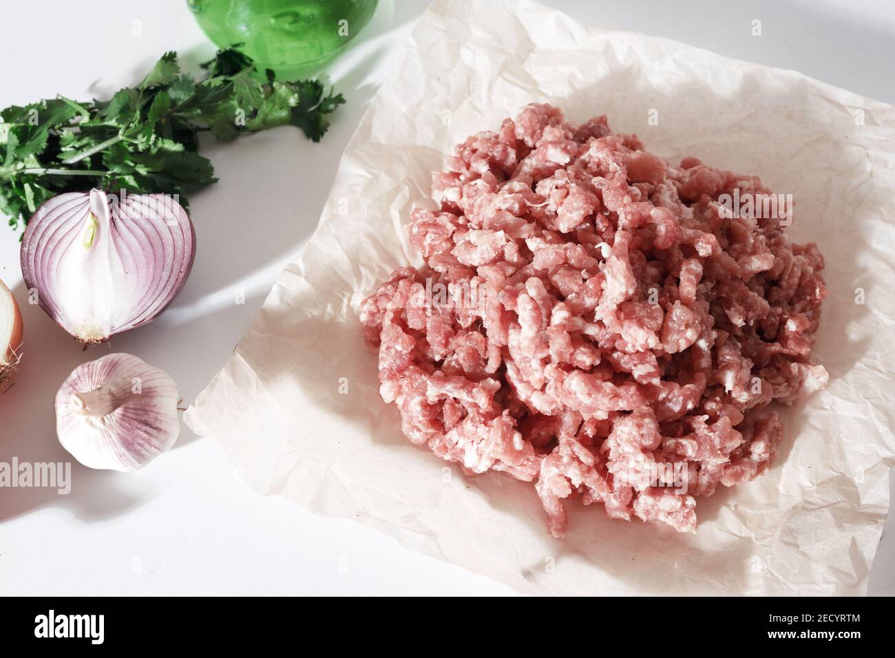 homemade minced pork on parchment paper Stock Photo - Alamy