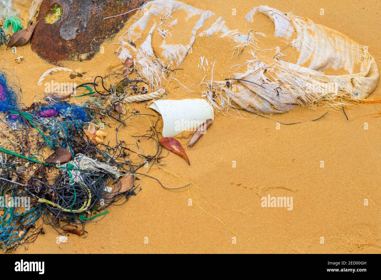 Garbage on sand beach. Trash on seashore. Ecological problem. Plastic ...