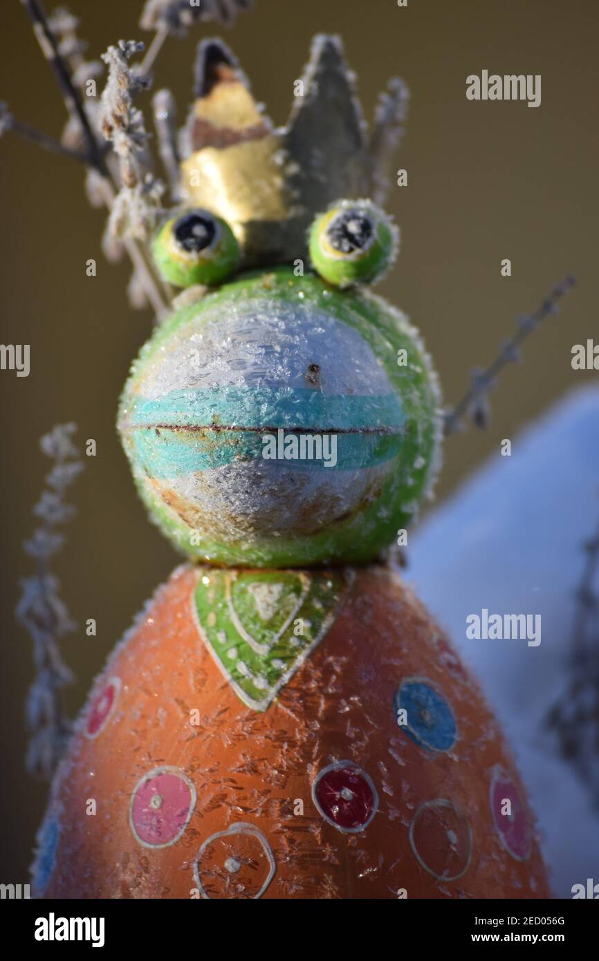colorful Tin frog prince in Winter Stock Photo - Alamy