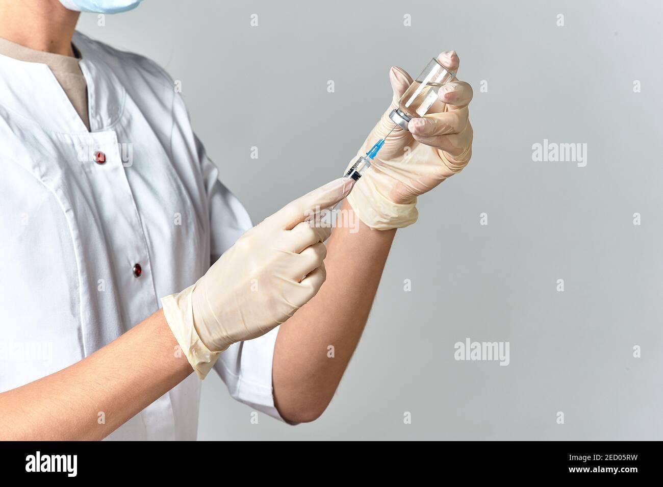 Nurse with syringe. Medical injection in hand. Vaccination kit. Covid ...