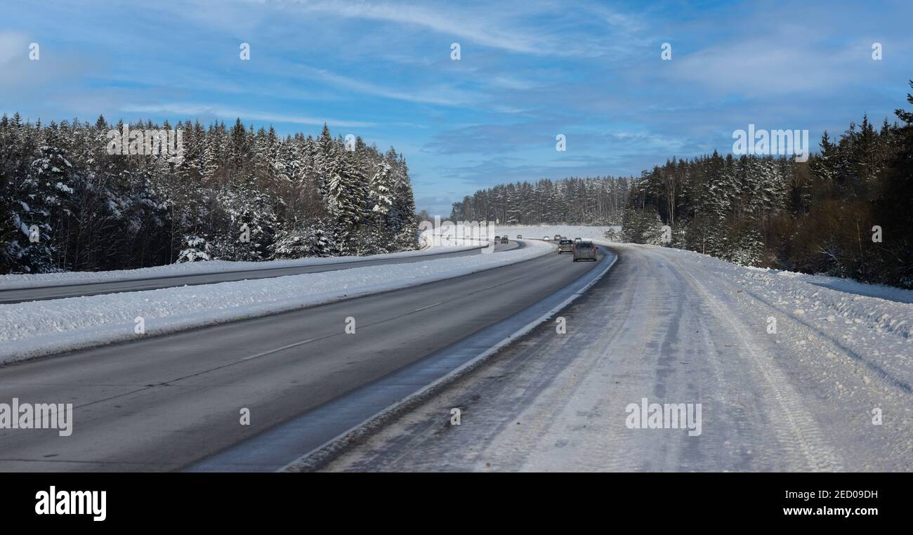 Winter landscape, road and shoulder covered with snow Stock Photo - Alamy