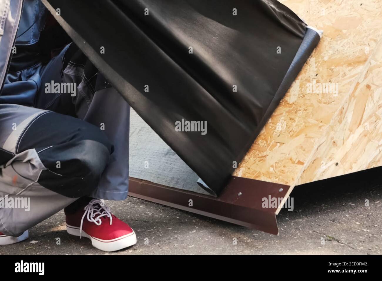 Sticking roofing material on a wooden base. Roof Mounting Sample Stock ...