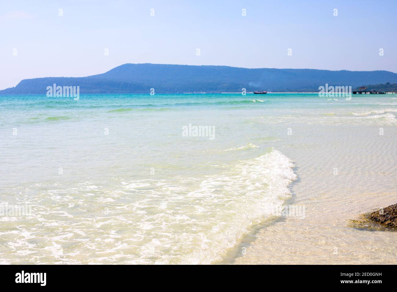 Sea wave over white sand beach. Empty seaside of tropical island with ...