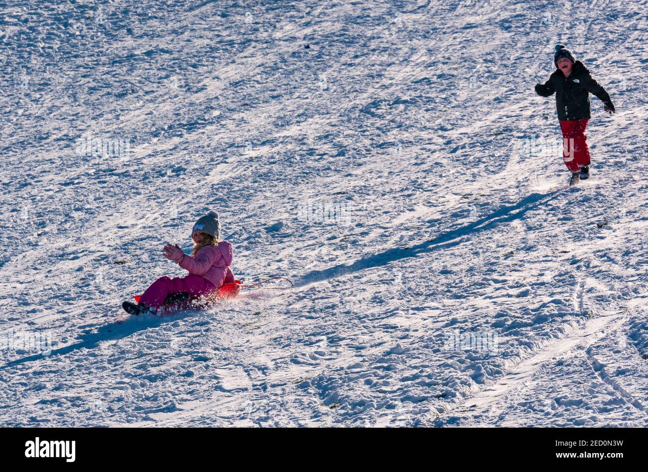 Girl and boy running hi-res stock photography and images - Alamy