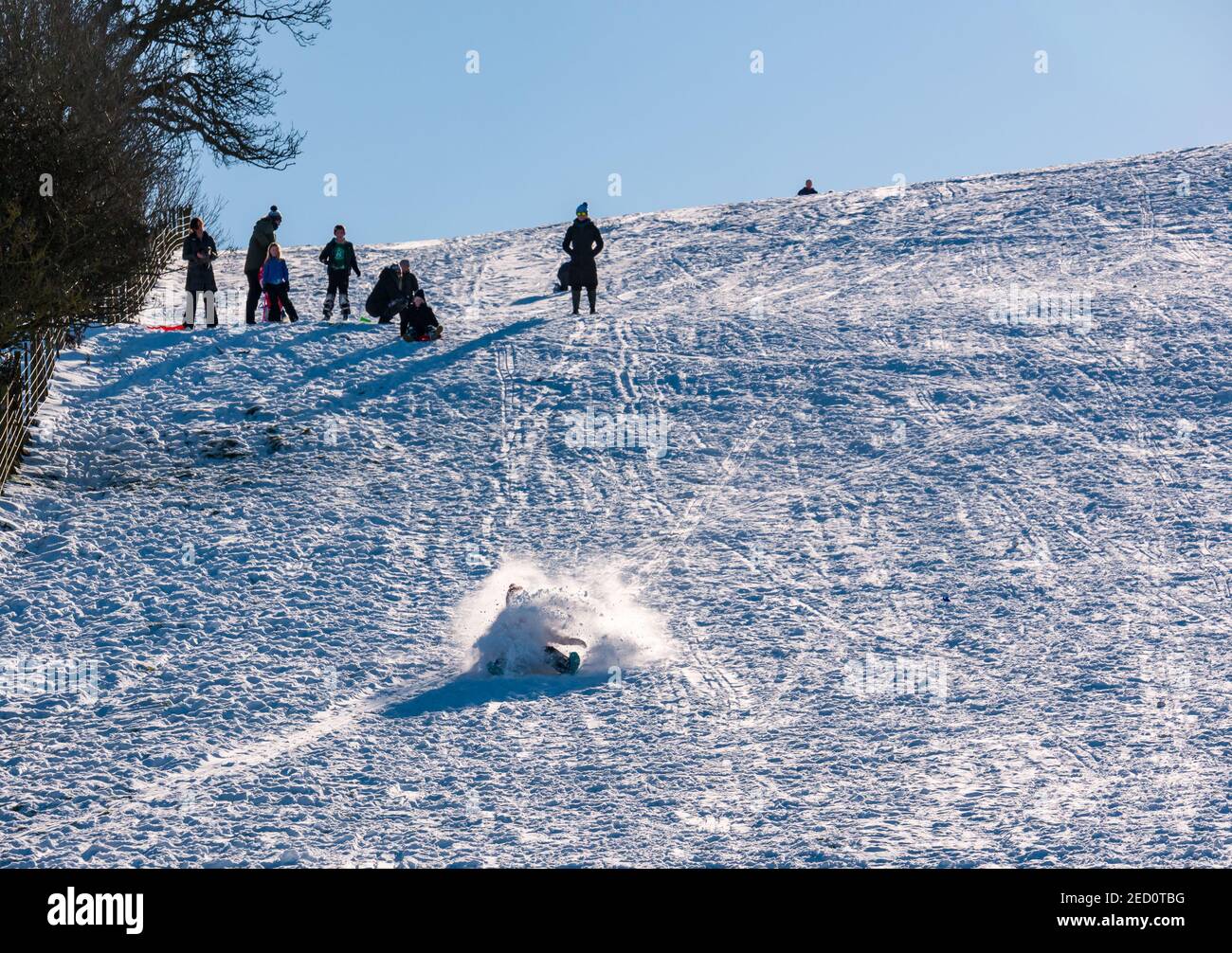 Falling off sled hi-res stock photography and images - Alamy