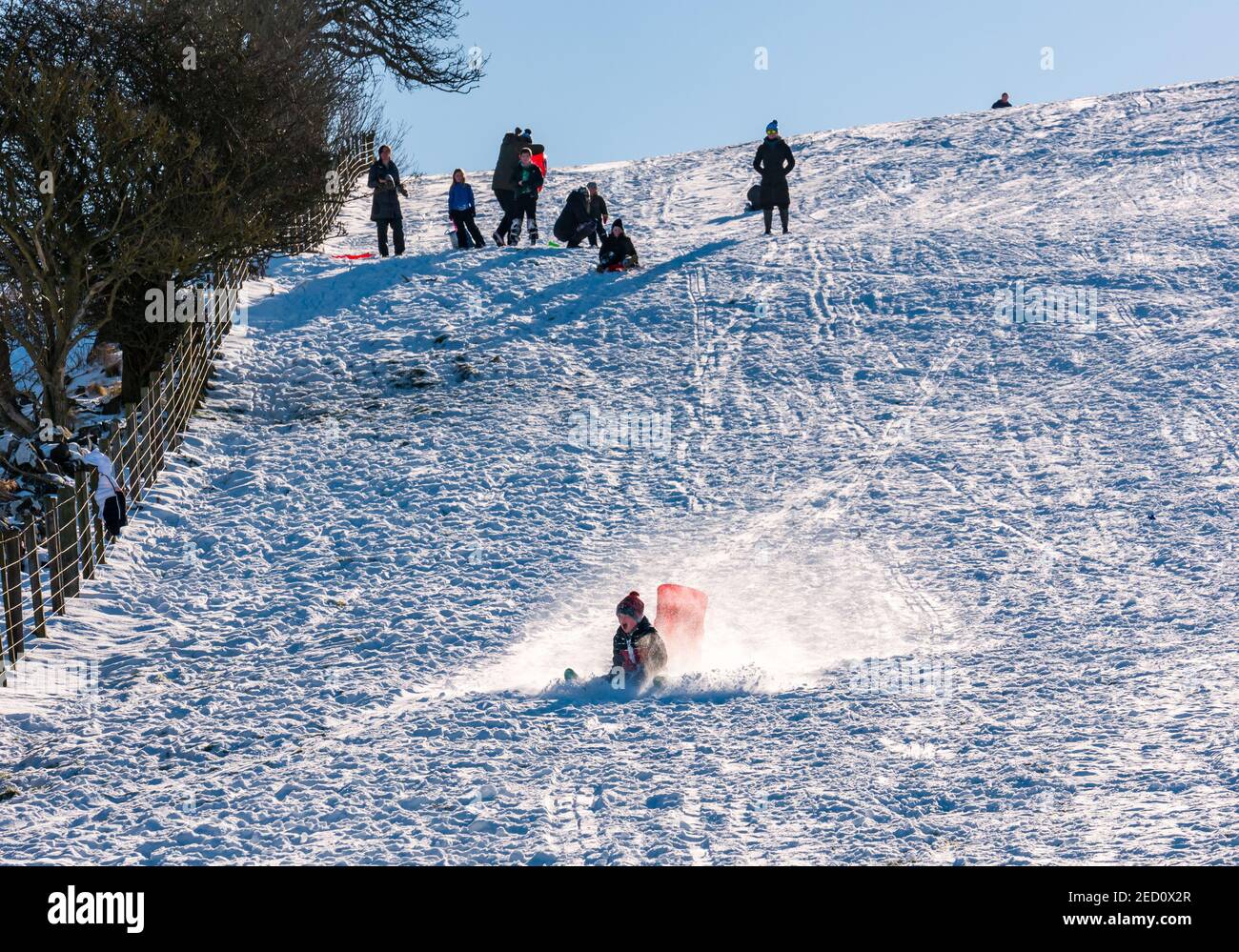 Falling off a snow a sledge sled hi-res stock photography and images ...