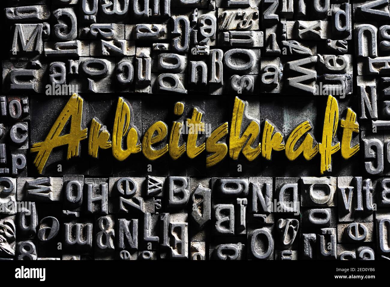 Old lead letters with gold lettering, word manpower Stock Photo - Alamy