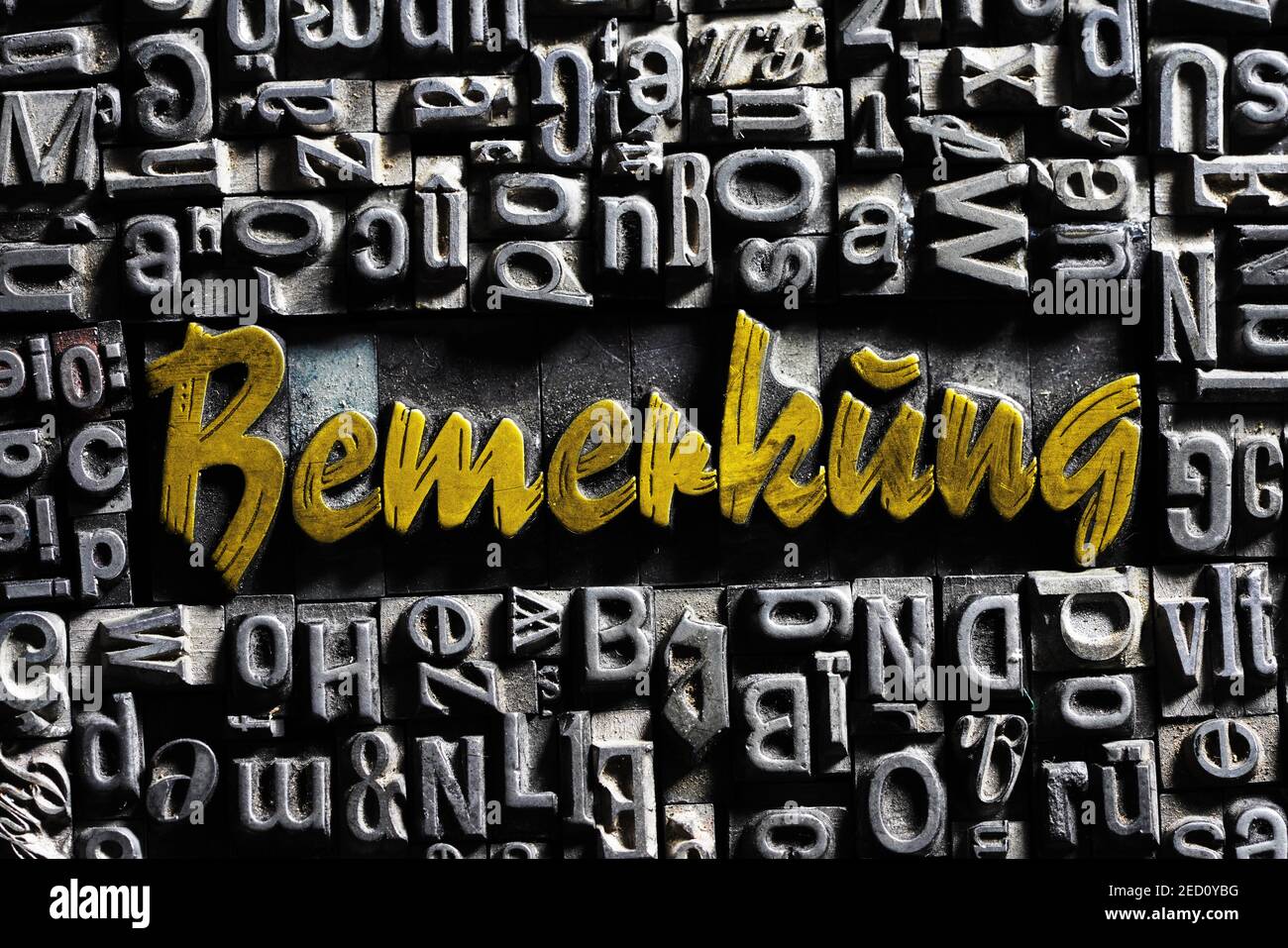 Old lead letters with golden writing, word remark Stock Photo - Alamy