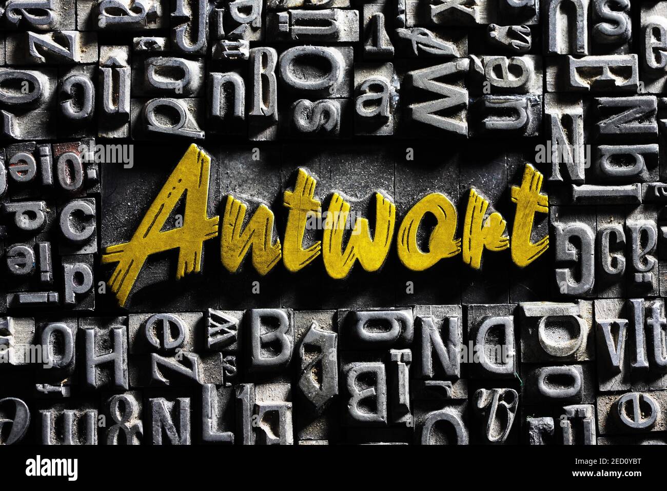 Old lead letters with golden writing, word answer Stock Photo - Alamy