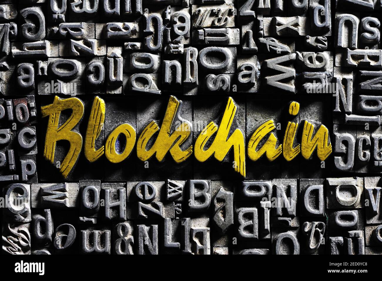 Old lead letters with golden writing, word Blockchain Stock Photo - Alamy
