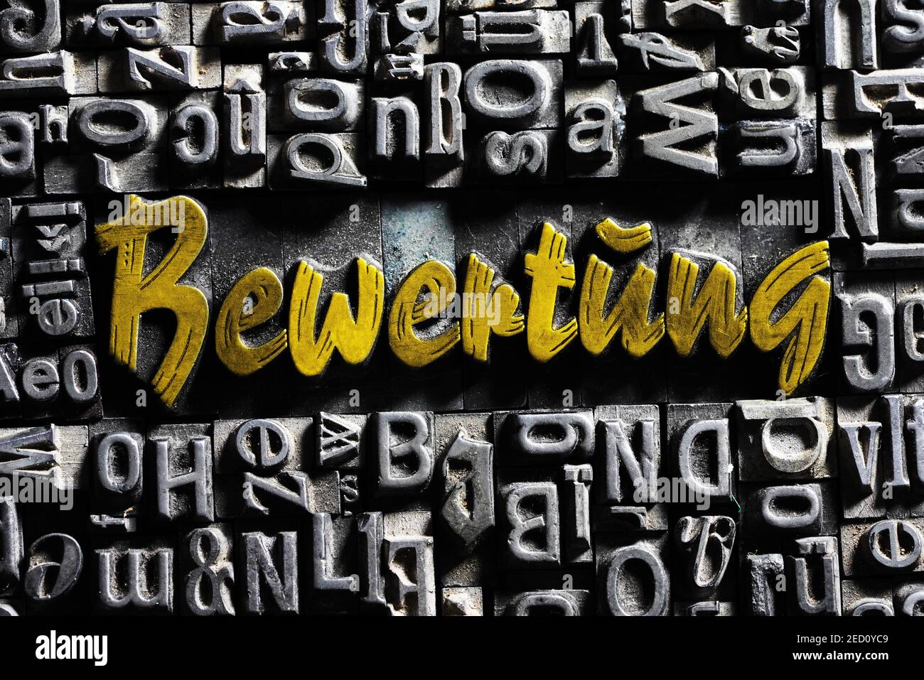 Old lead letters with golden writing, word rating Stock Photo - Alamy