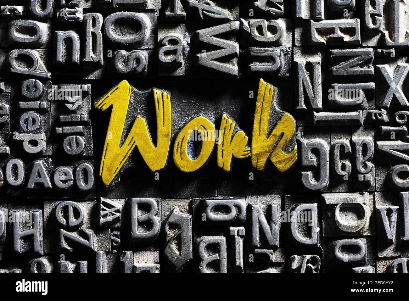 Old lead letters with golden writing, word Work Stock Photo - Alamy