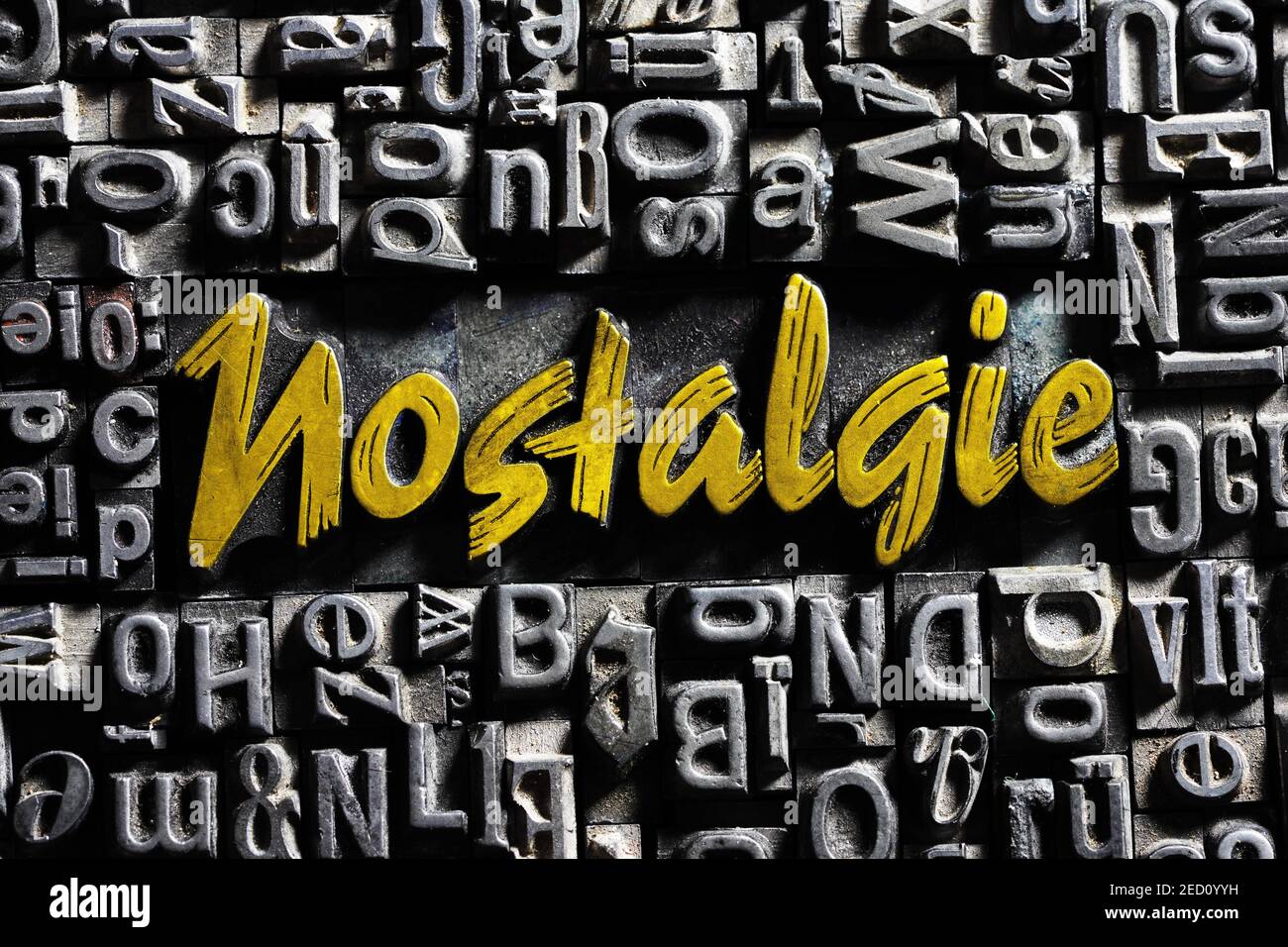 Old lead letters with golden writing, word nostalgia Stock Photo - Alamy