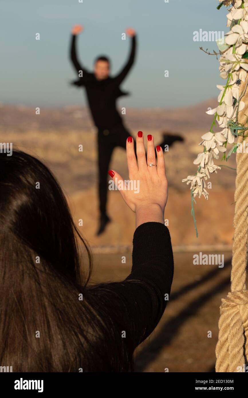 Marriage proposal in Cappadocia, womans hand with diamond engagement ...