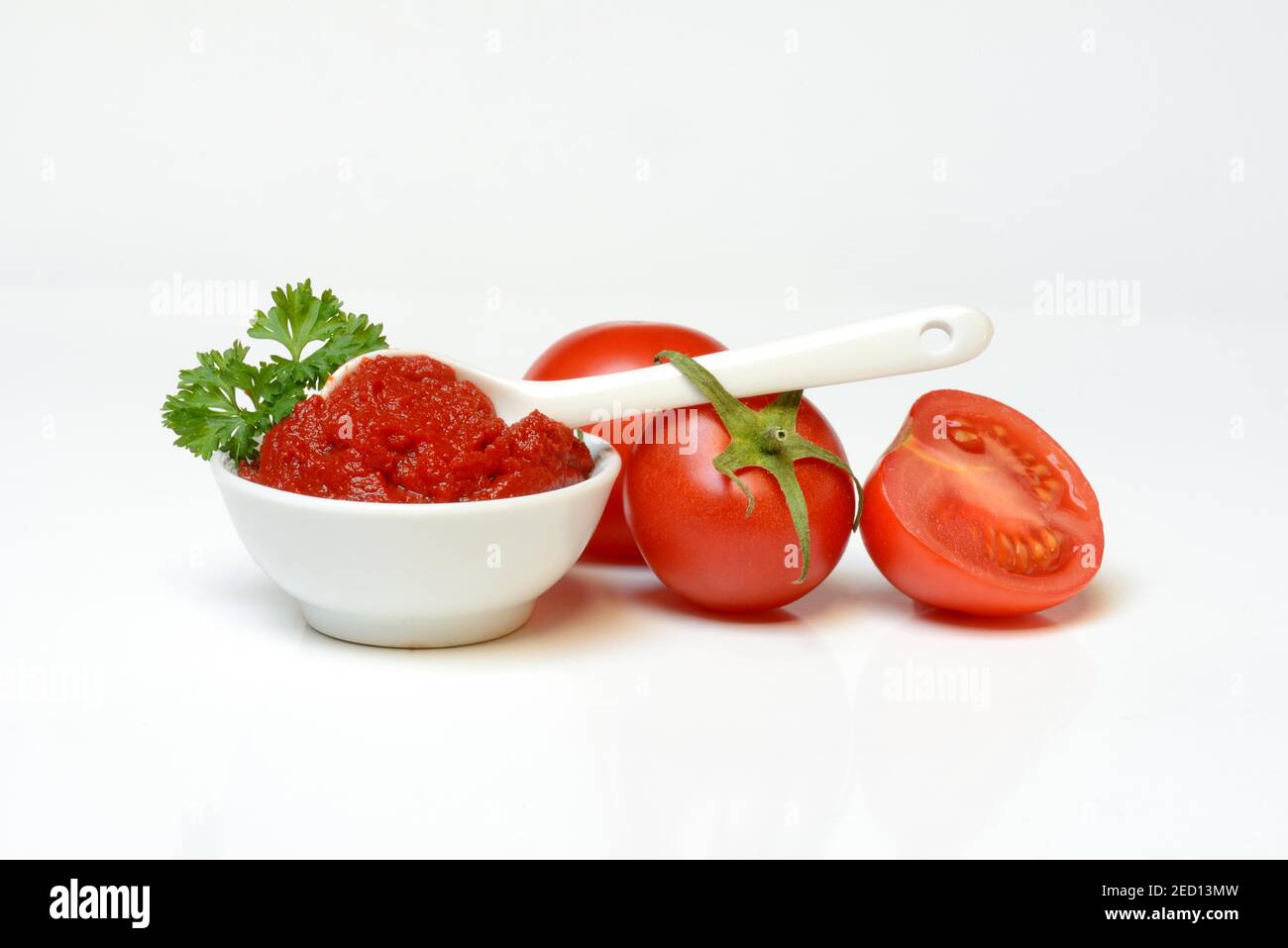 Tomato paste on spoon hi-res stock photography and images - Alamy