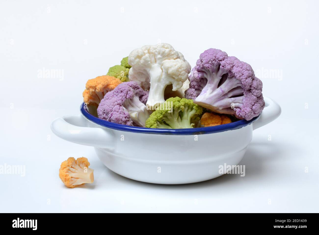 Colored cauliflower in a bowl, white background, Germany Stock Photo ...