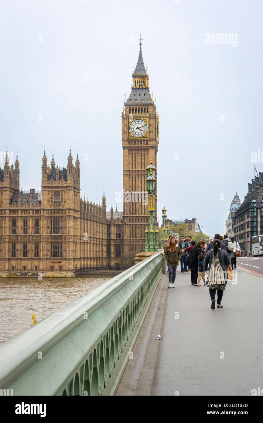 Big Ben and pedestrians on Westminster Bridge, London, UK Stock Photo ...