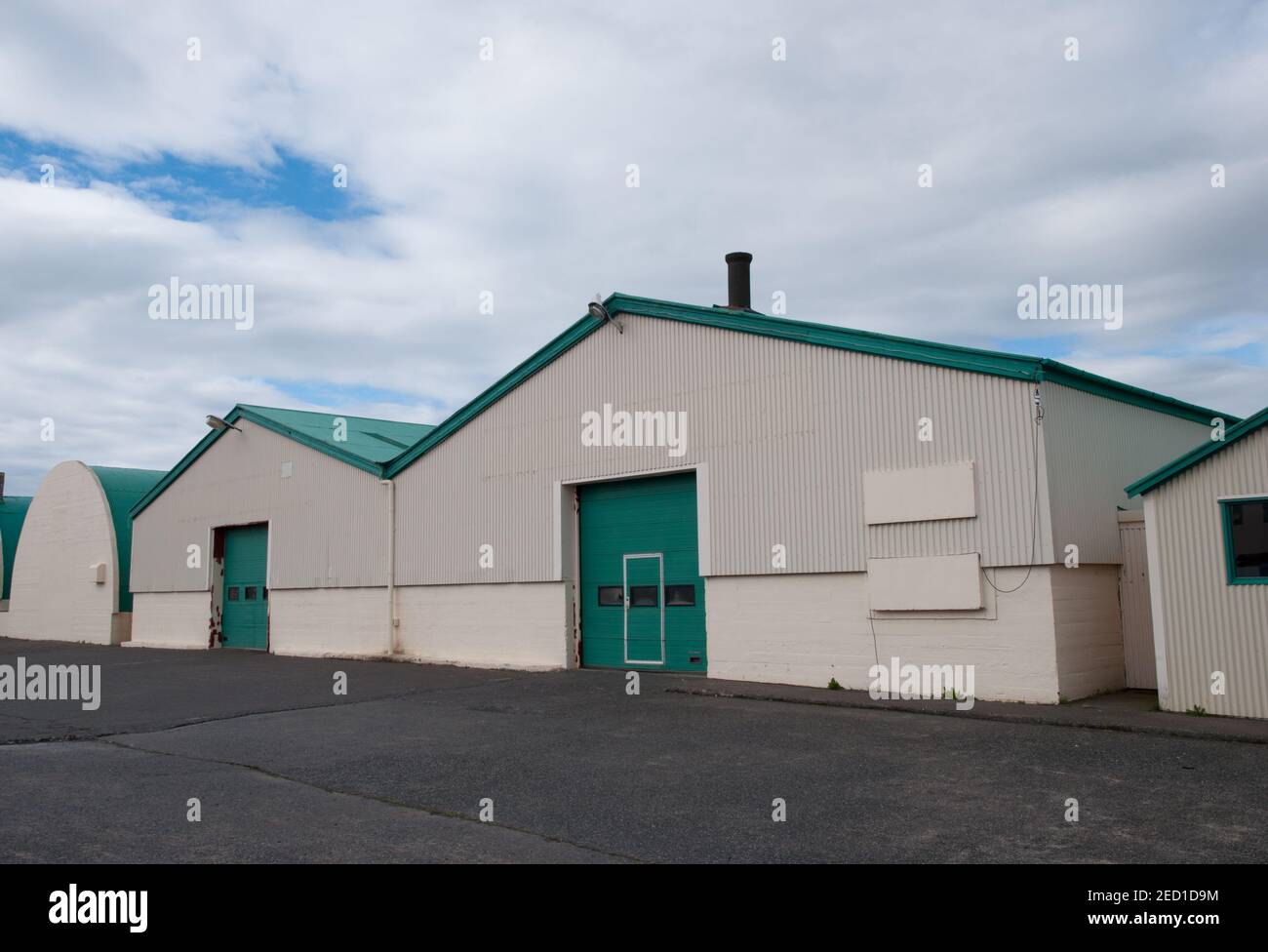 Old fish processing buildings in Hofn Iceland Stock Photo - Alamy