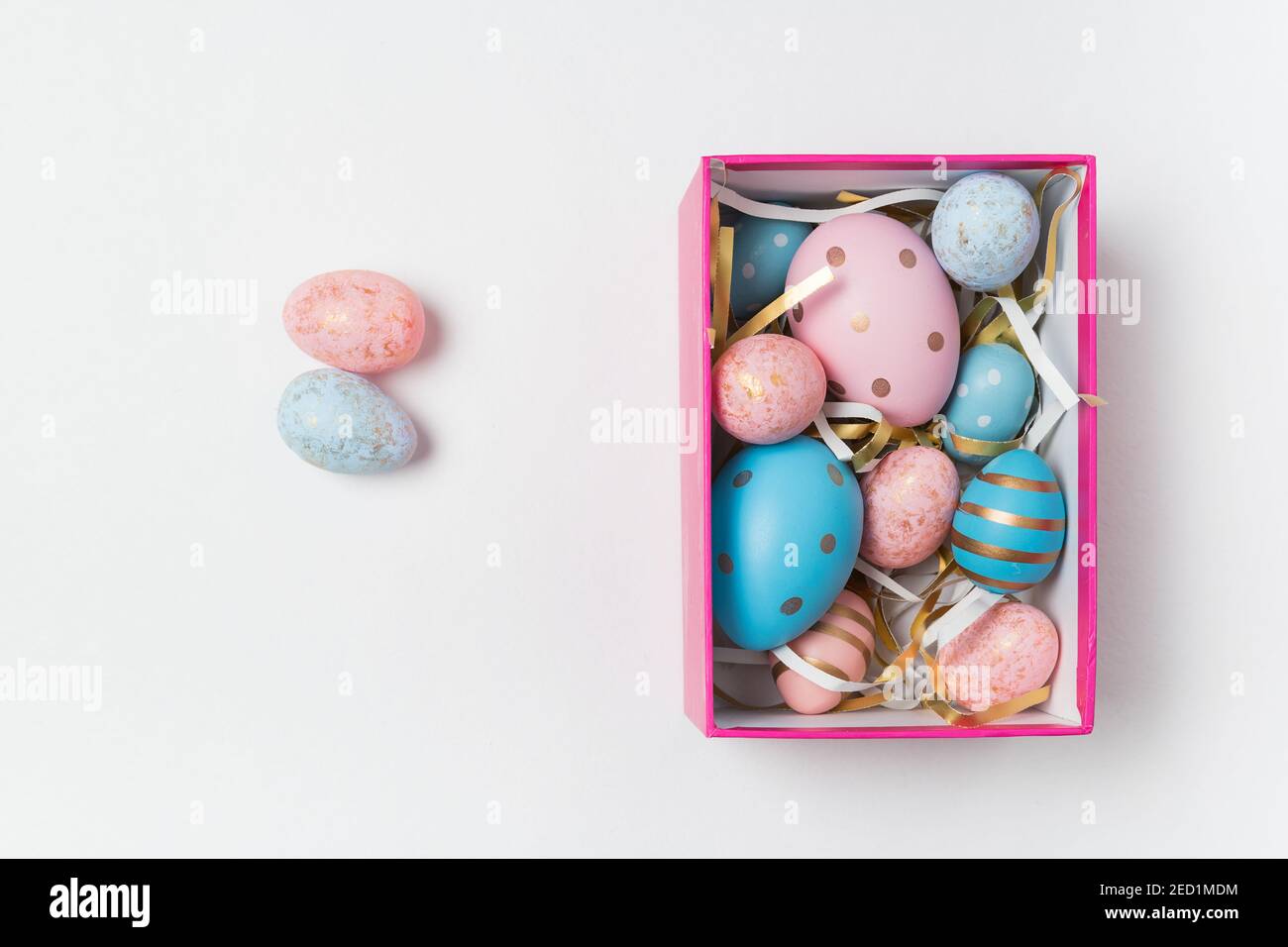 Easter eggs in pastel colors in box on white background. Happy Easter ...