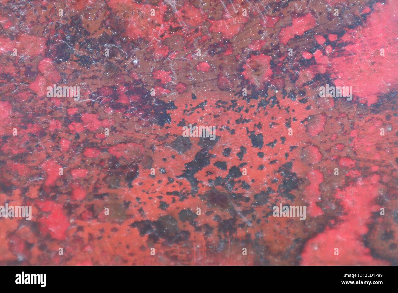 Well worn red paint Stock Photo - Alamy