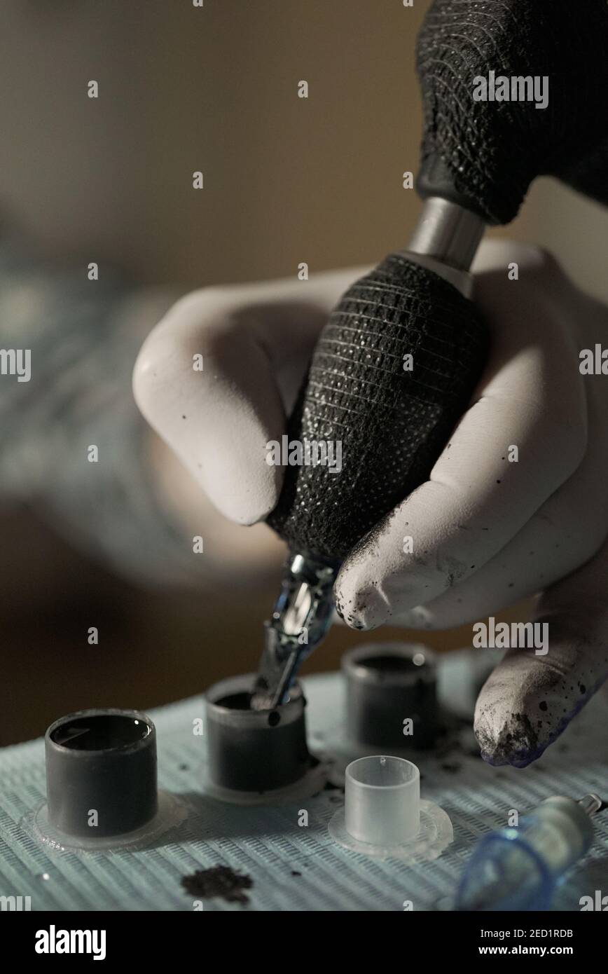 Tattooist ink hi-res stock photography and images - Alamy