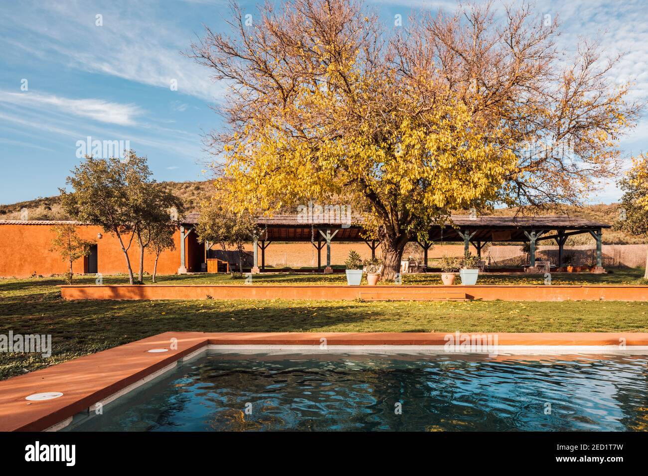 Swimming pool with clear water in big courtyard near residential ...