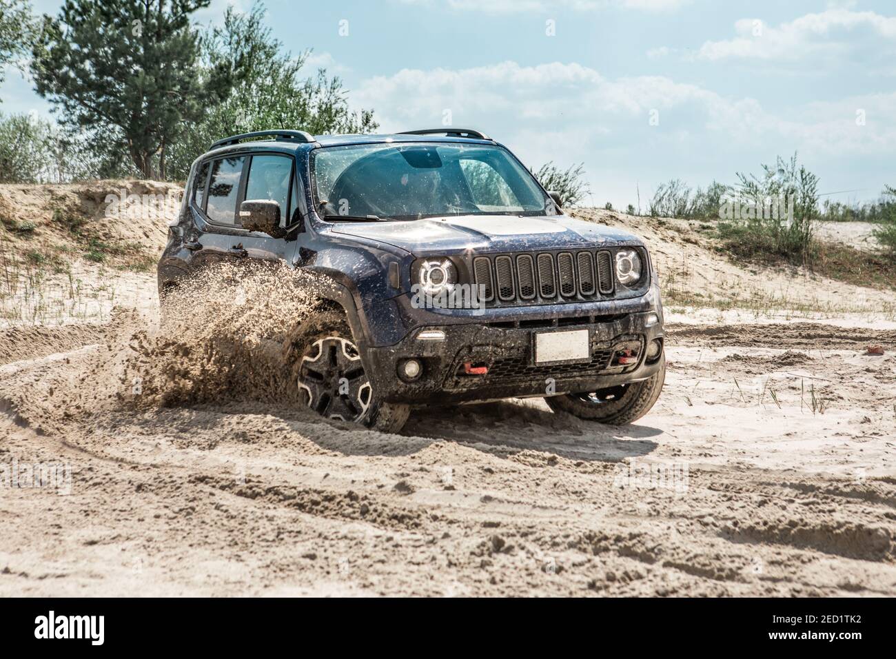 man drifting doing donuts at sand beach. having fun Stock Photo - Alamy