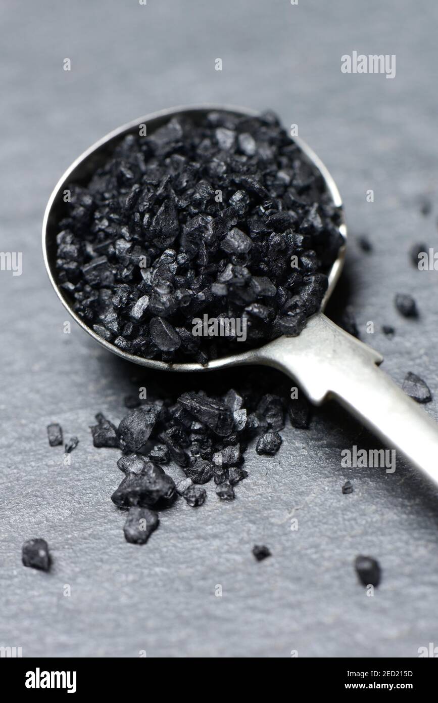 Black Hawaiian salt in spoon, lava salt, sea salt with activated carbon ...