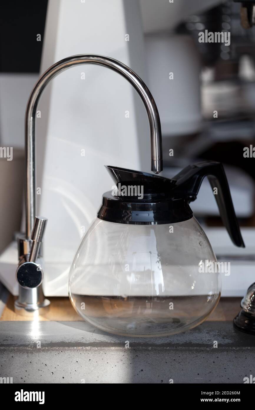 Filling water pot hi-res stock photography and images - Alamy