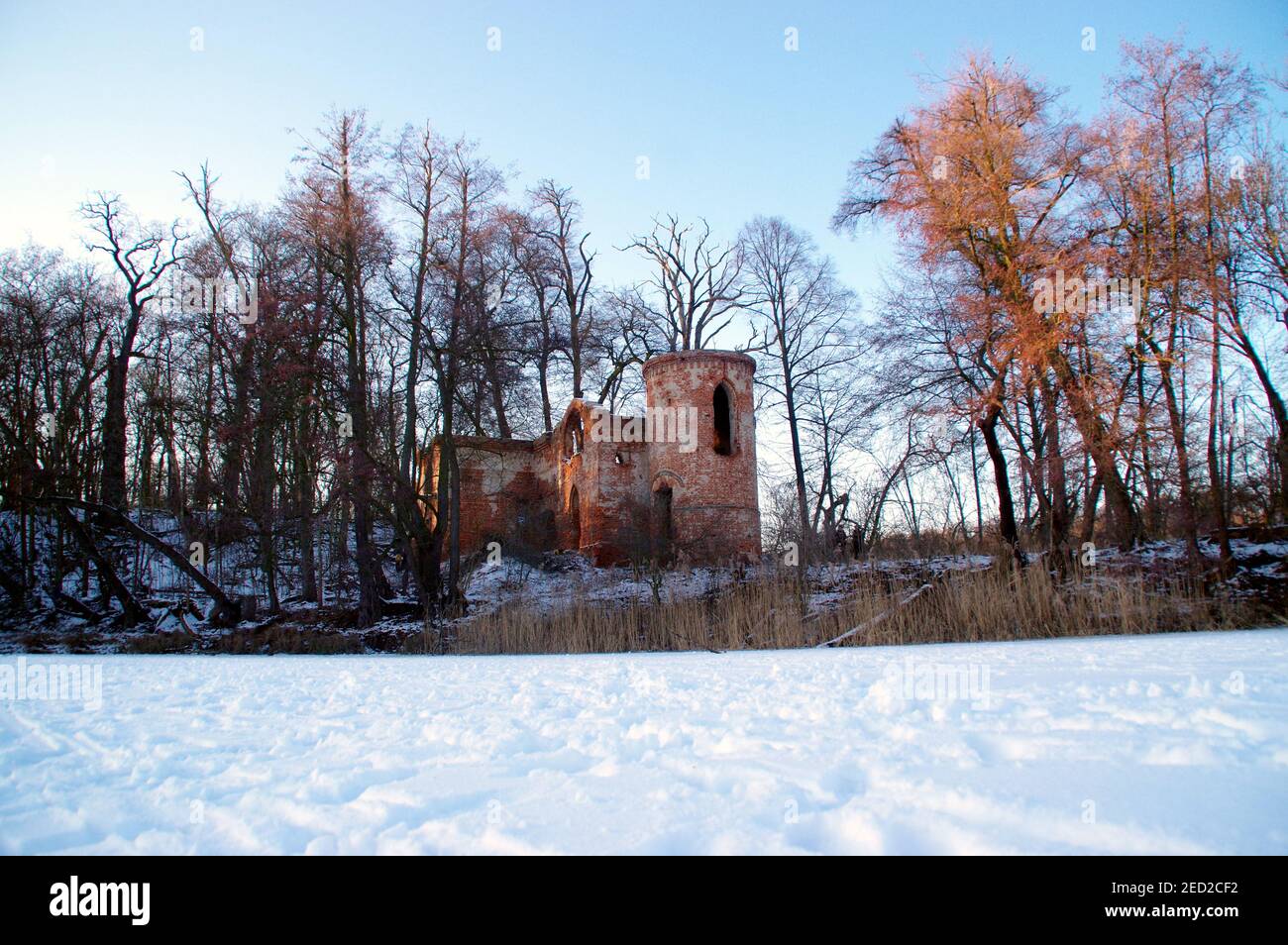 Medieval castle ruins on the island. Winter scenery with an old ...