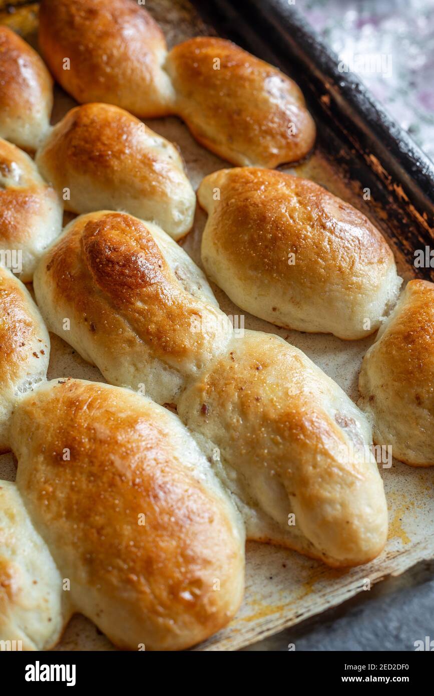 Baked homemade pies on a baking sheet Stock Photo - Alamy