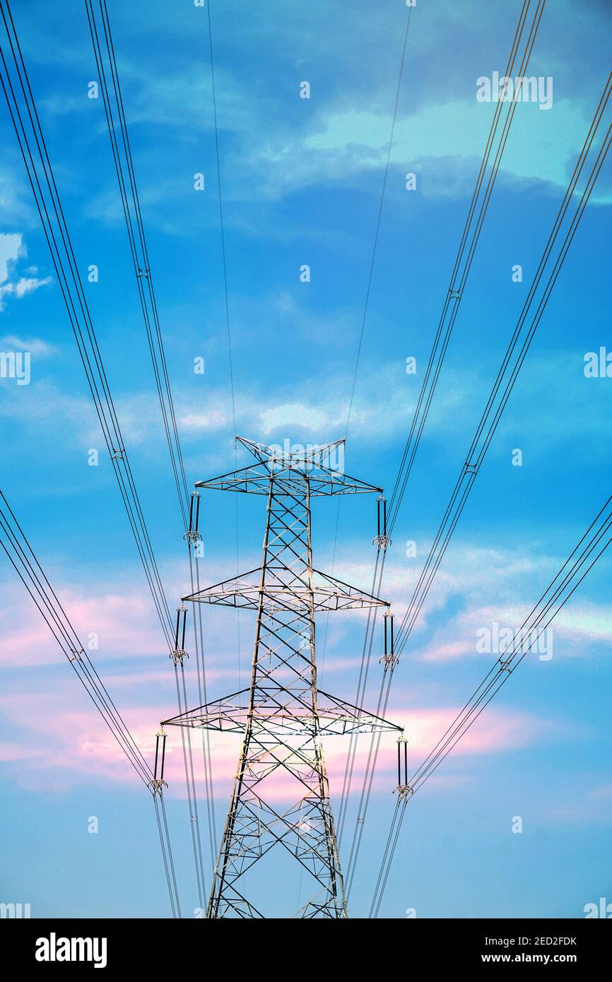 High voltage transmission towers line Stock Photo - Alamy