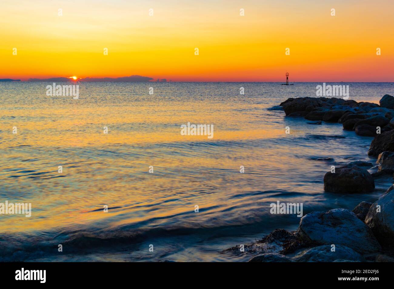 Sunrise over Paralia Katerinis beach.Paralia is a tourist seaside ...
