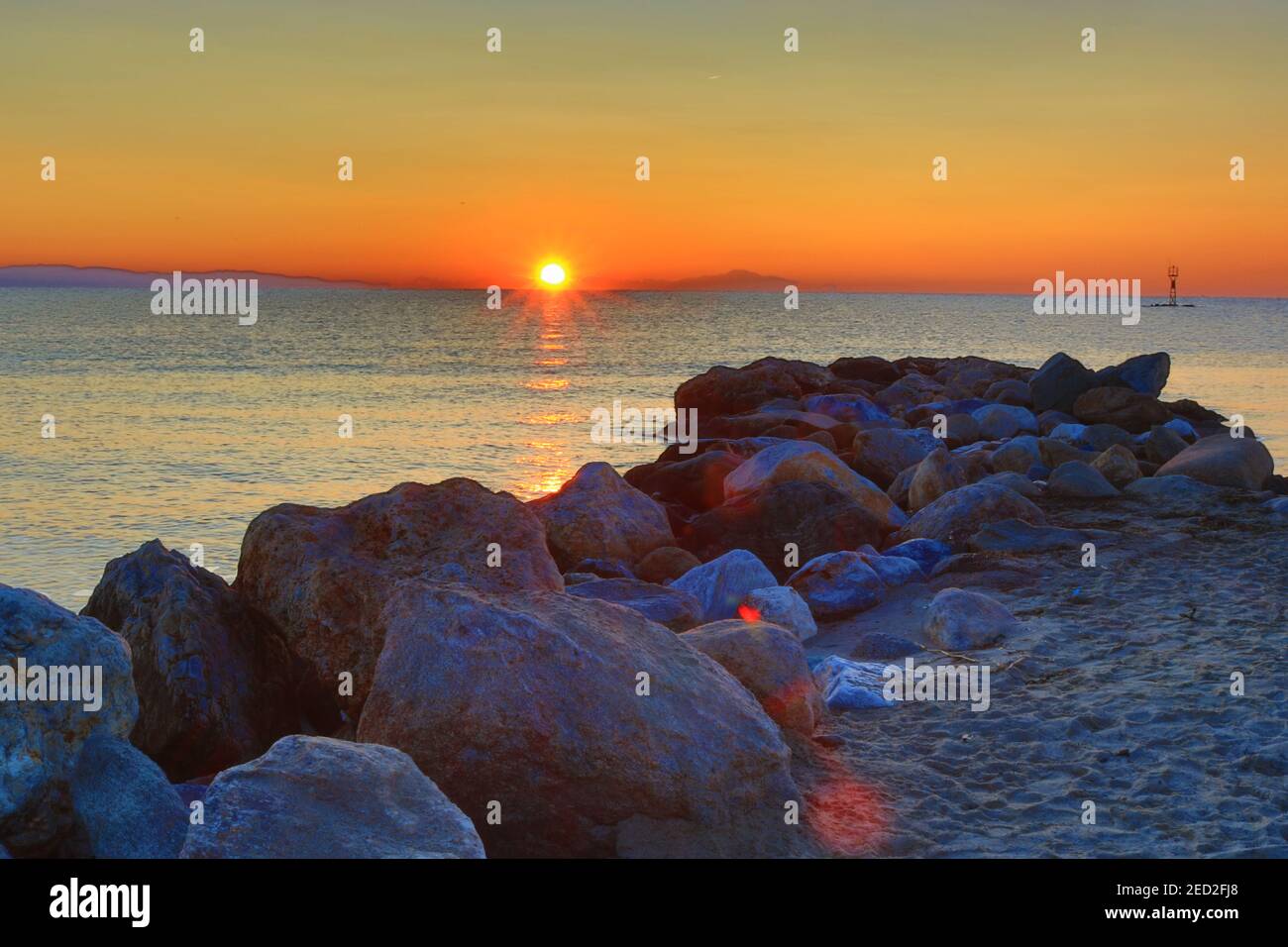 Sunrise over Paralia Katerinis beach.Paralia is a tourist seaside ...