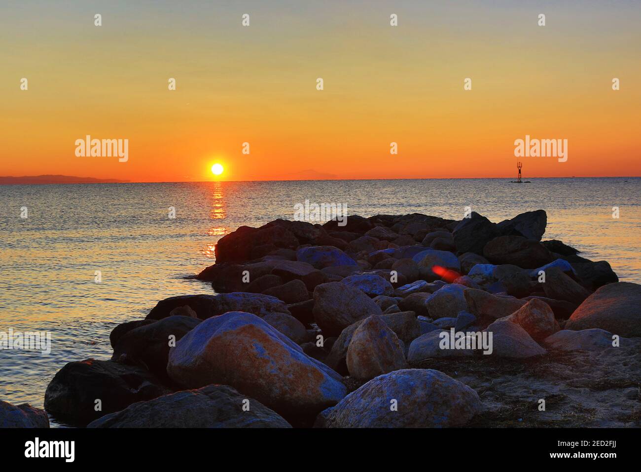 Sunrise over Paralia Katerinis beach.Paralia is a tourist seaside ...