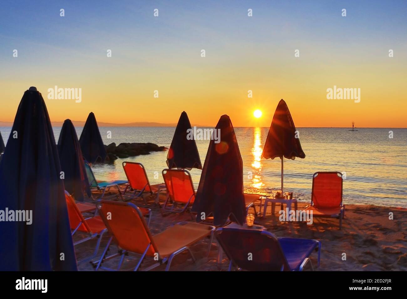 Sunrise over Paralia Katerinis beach.Paralia is a tourist seaside ...