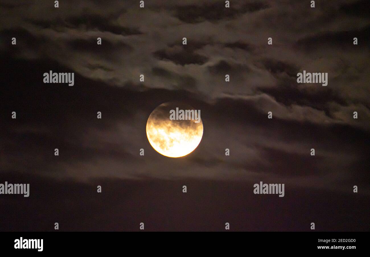full moon in the sky with clouds landscape Stock Photo - Alamy