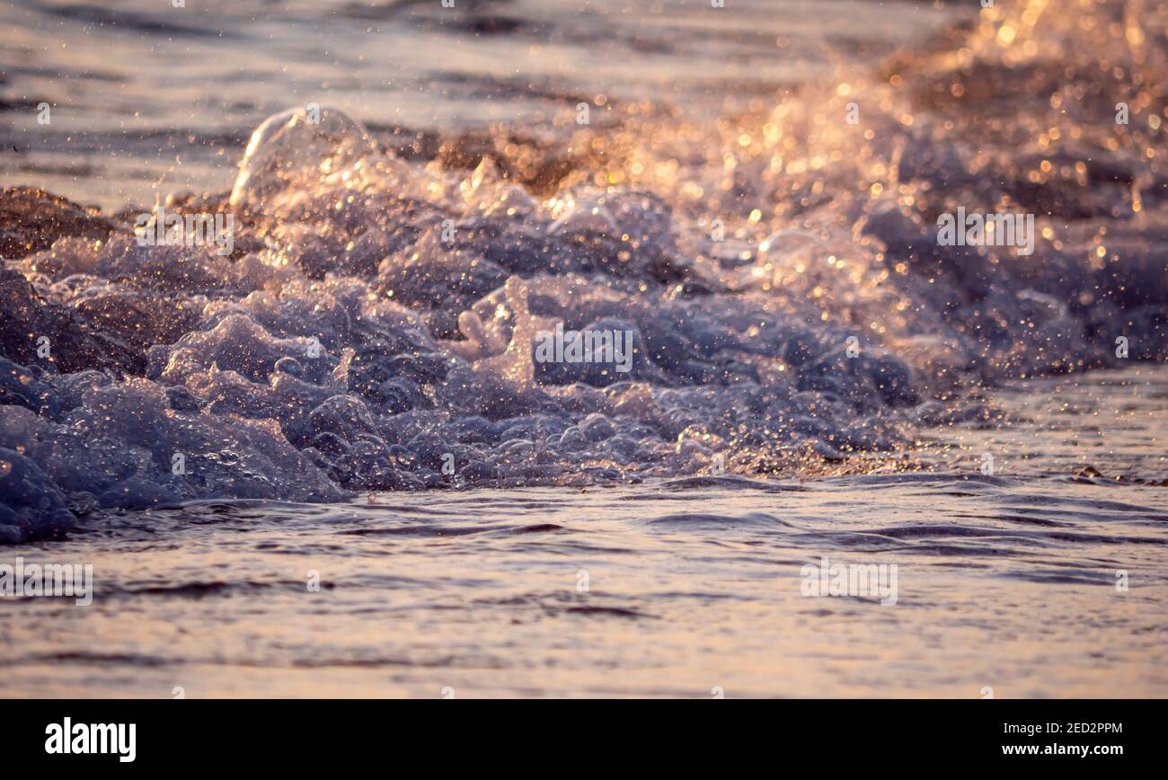 wave splash sea beach macro, close up Stock Photo - Alamy