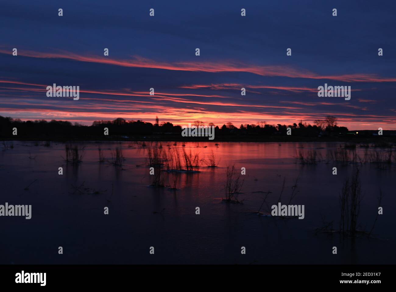 Storms, sunset and sunrise uk Stock Photo - Alamy