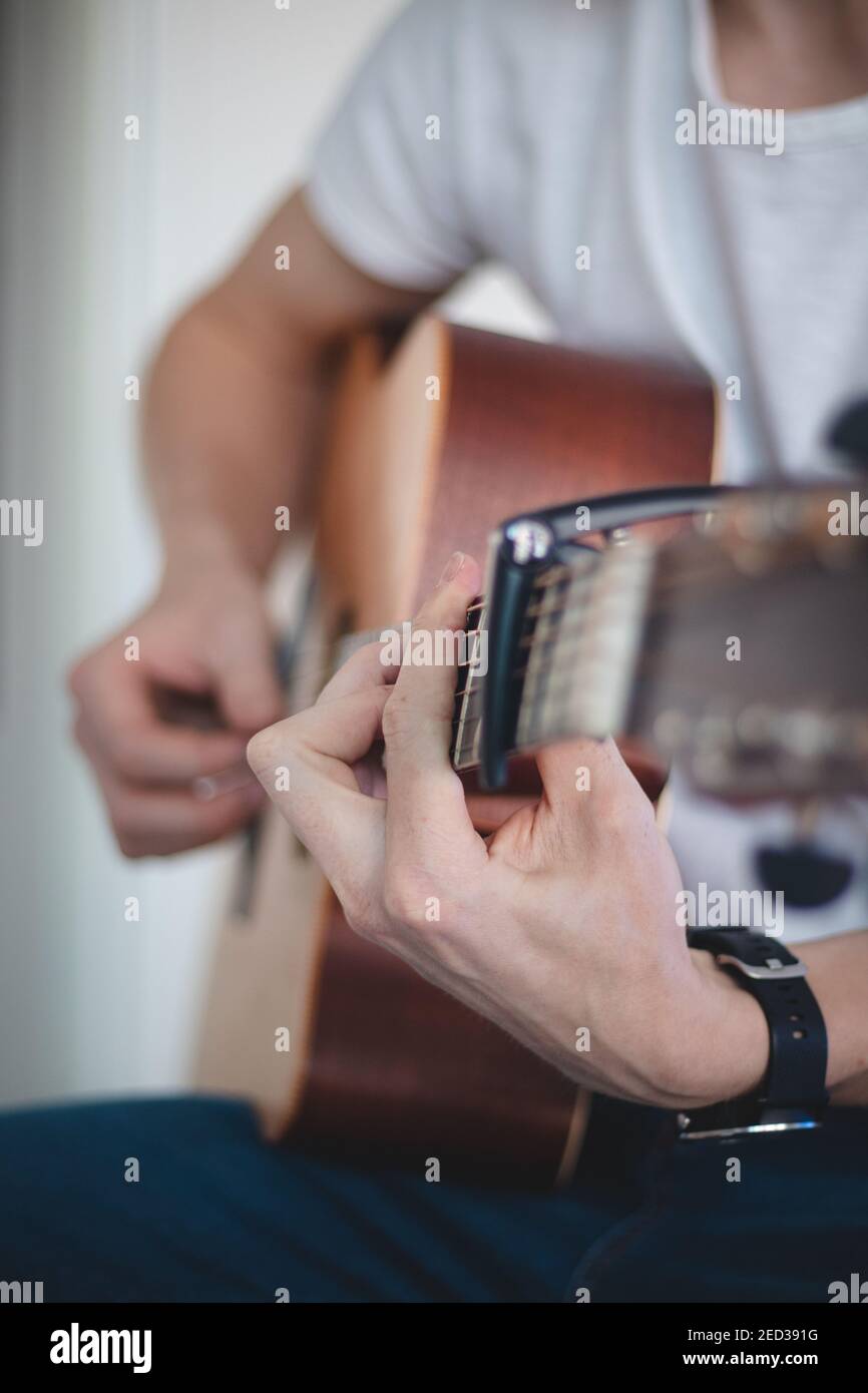 Acoustic guitar guitarist playing. Musical instrument with performer ...