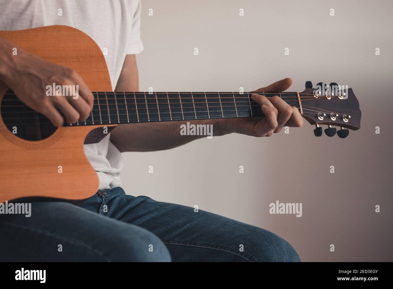 Closeup of hands working on an instrumental instrument while playing ...