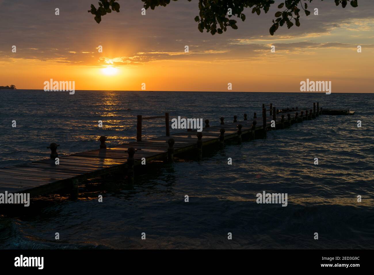 A mesmerizing view of a wooden dock over Lake Victoria, Tanzania with ...
