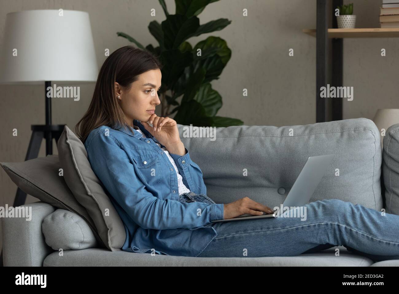 Woman and reading email and pensive hi-res stock photography and images ...